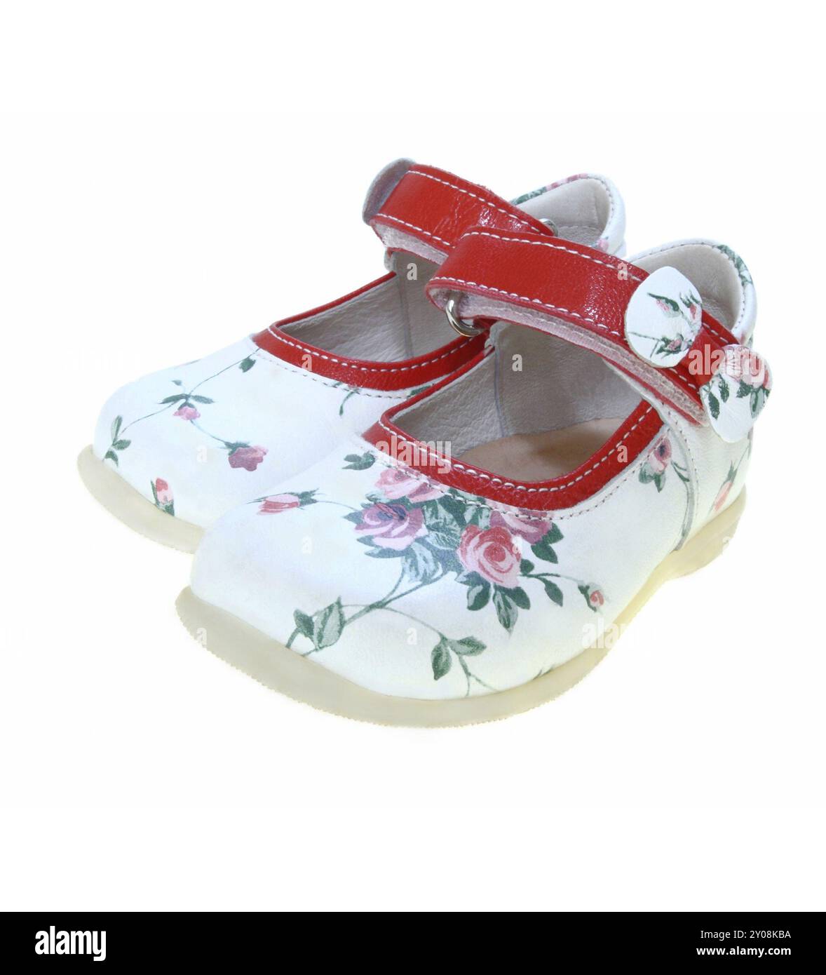 Child's red leather shoes with roses pattern Stock Photo - Alamy