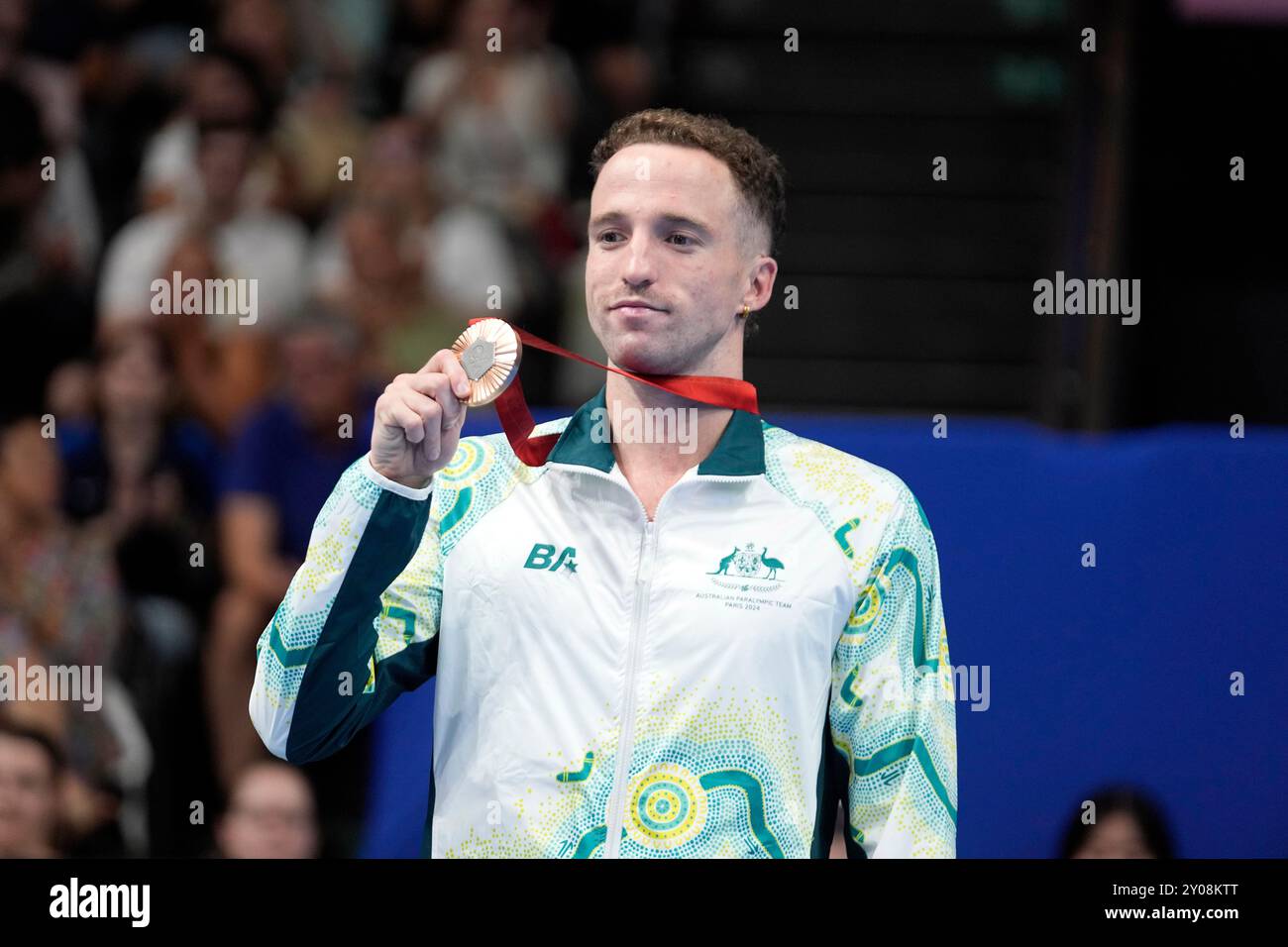 Australia's bronze medalist Thomas Gallagher poses after the men's 100 ...