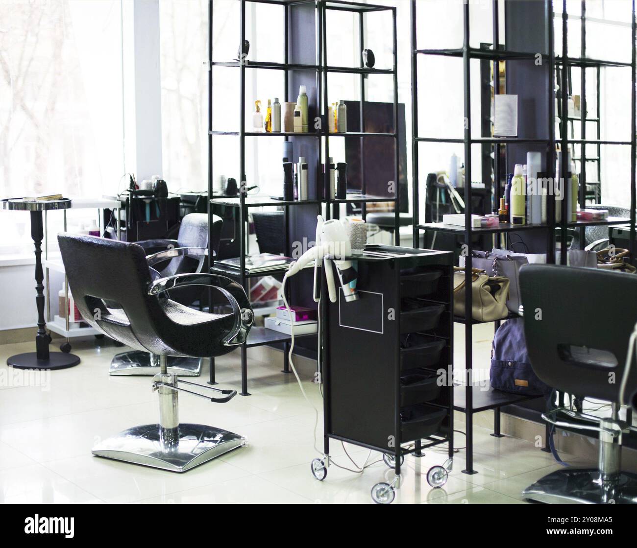 Brand new interior of european beauty salon. Work place of hair stylist ...