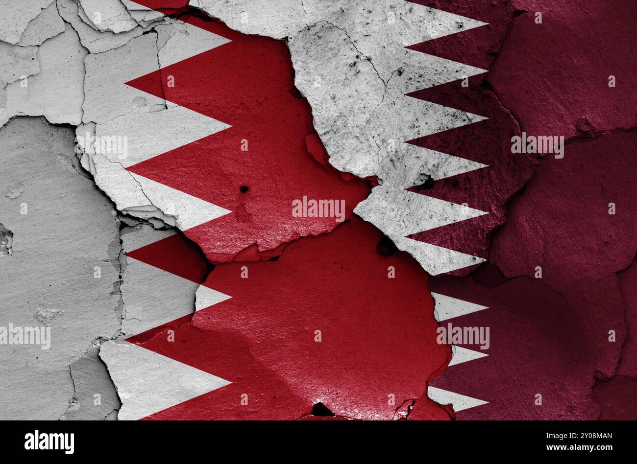 Flags of Bahrain and Qatar painted on cracked wall Stock Photo - Alamy