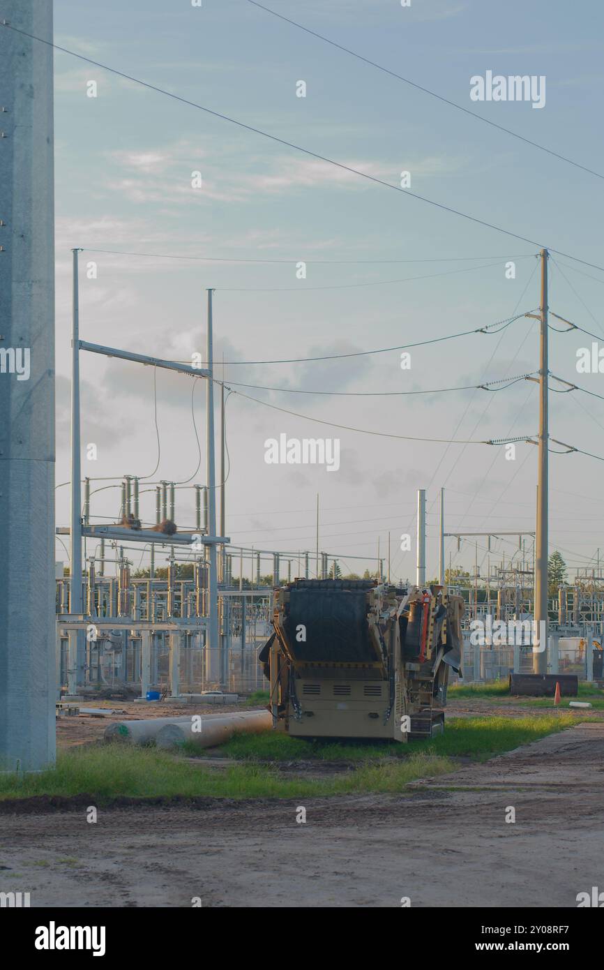 Vertical view near sunset of Electric Substation with High Power Lines ...