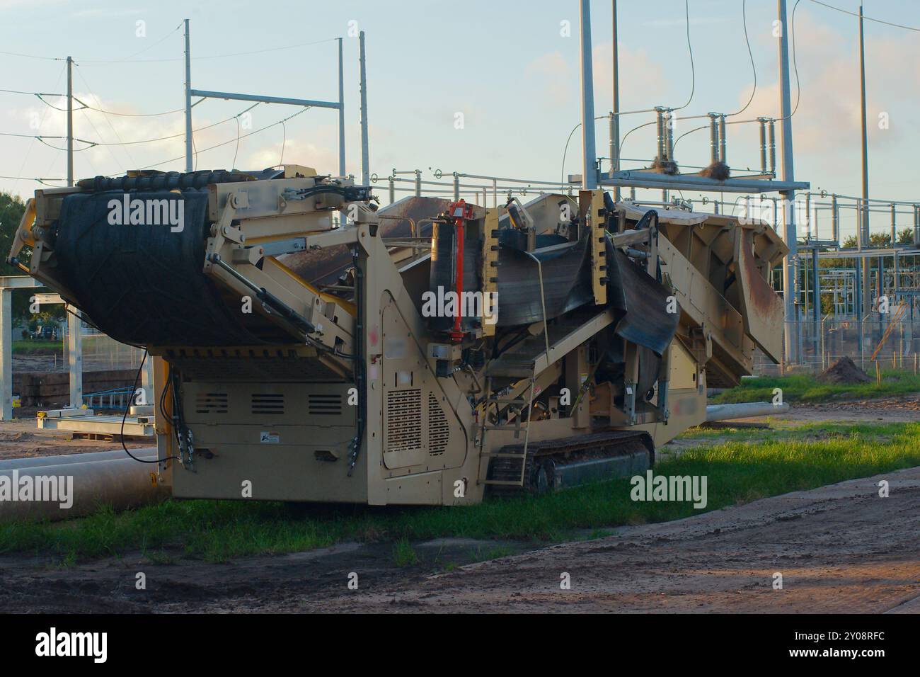 Wide side view near sunset large Construction Conveyor Feeder Stacker ...