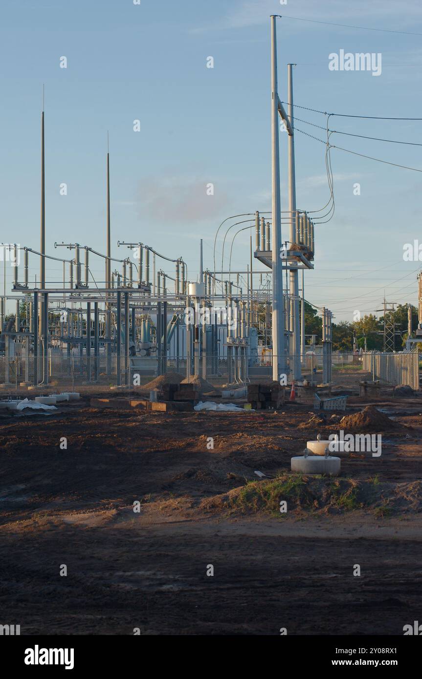 Vertical view near sunset of Electric Substation with High Power Lines ...