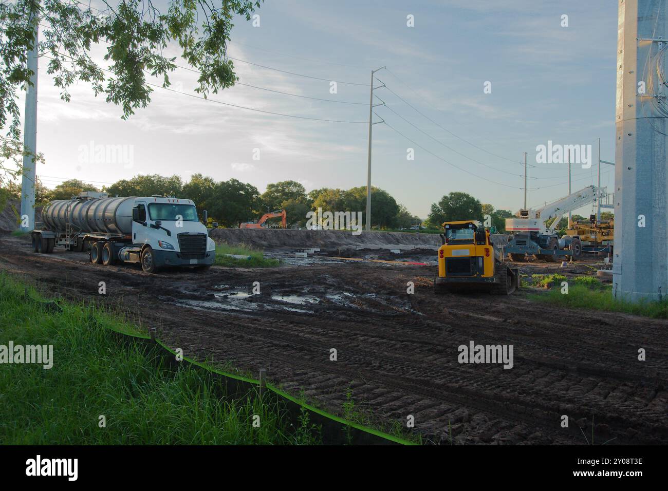 Wide view near sunset of Electric Substation with High Power Lines in ...
