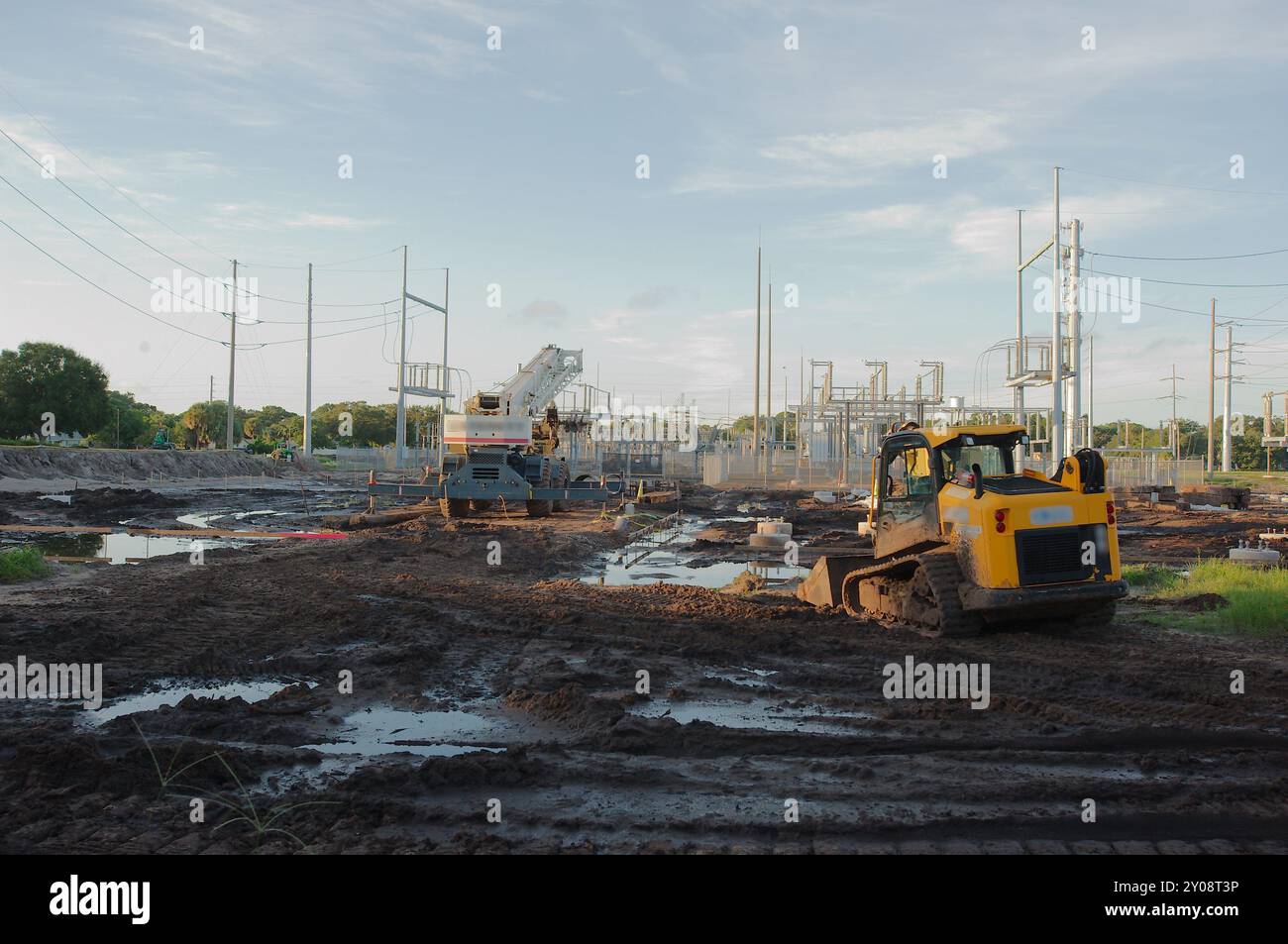 Wide view near sunset of Electric Substation with High Power Lines in ...