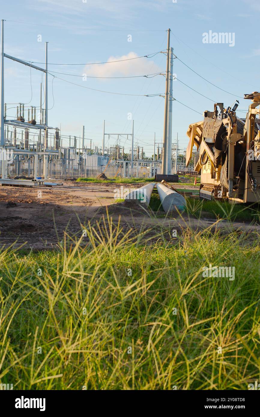Vertical view near sunset of Electric Substation with High Power Lines ...