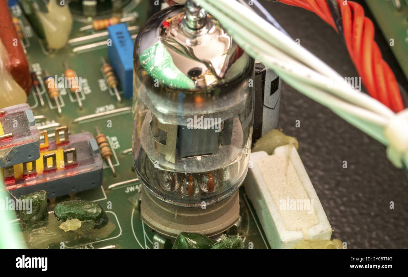 Electrical setup with glowing tube on a circuit board with electrical ... Electrical setup with glowing tube on a circuit board with electrical ...
