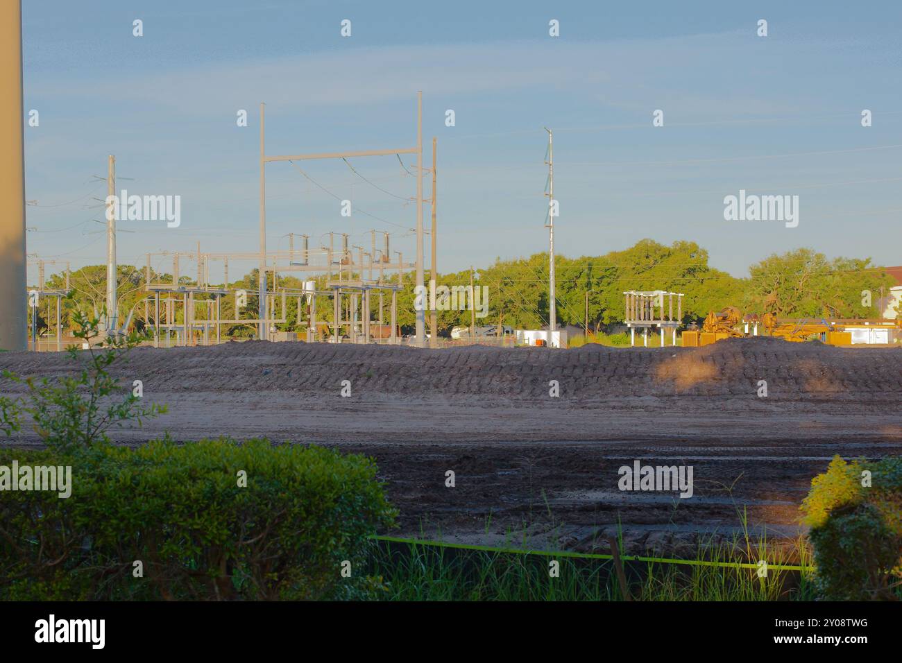 Wide view near sunset of Electric Substation with High Power Lines in ...