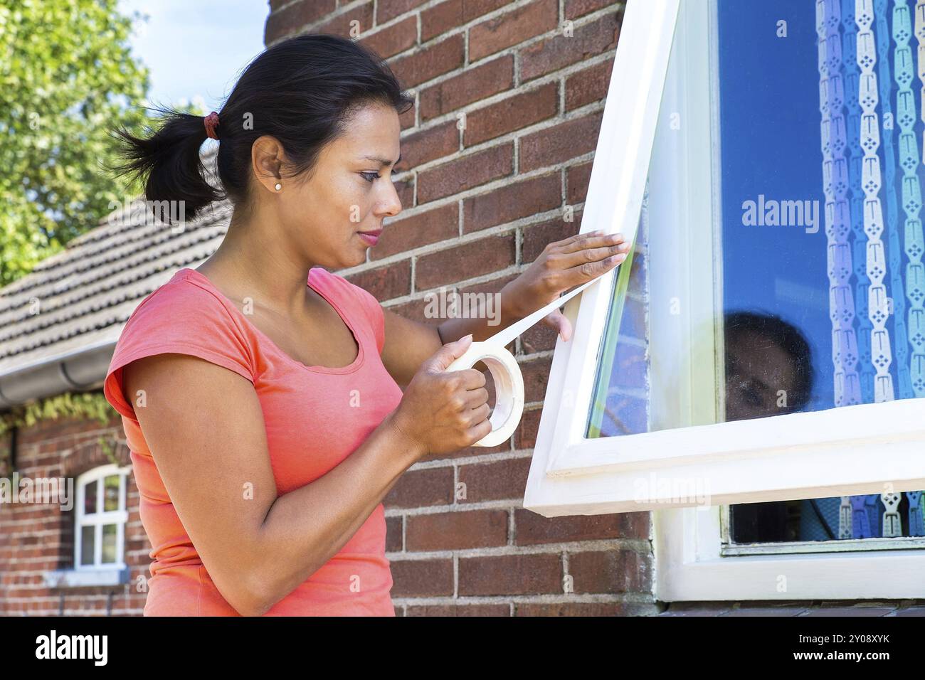 Windows with tape hi-res stock photography and images - Alamy