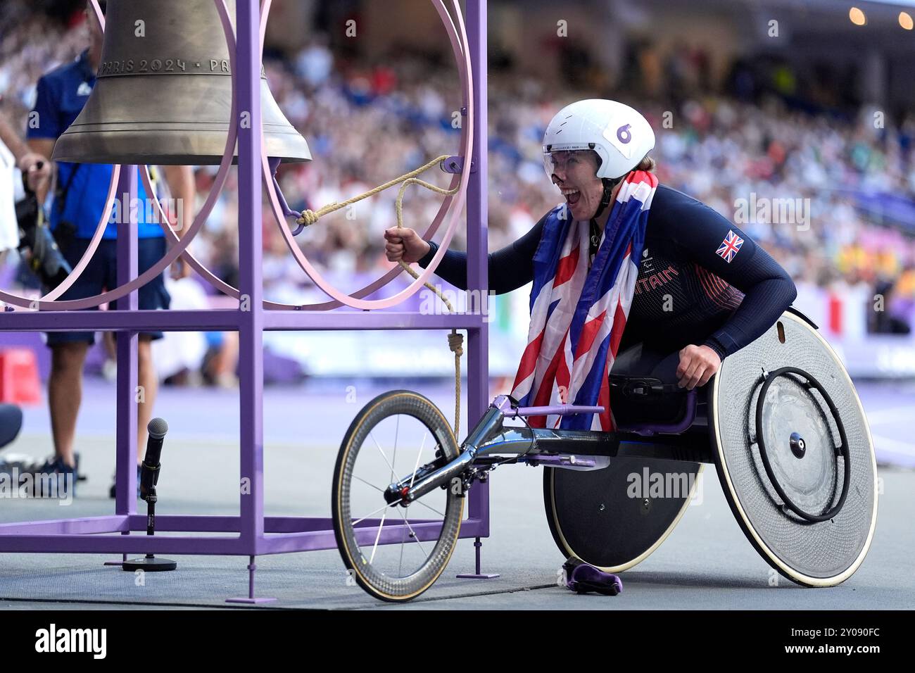 Great Britain's Hannah Cockroft rings the bell after winning gold in ...