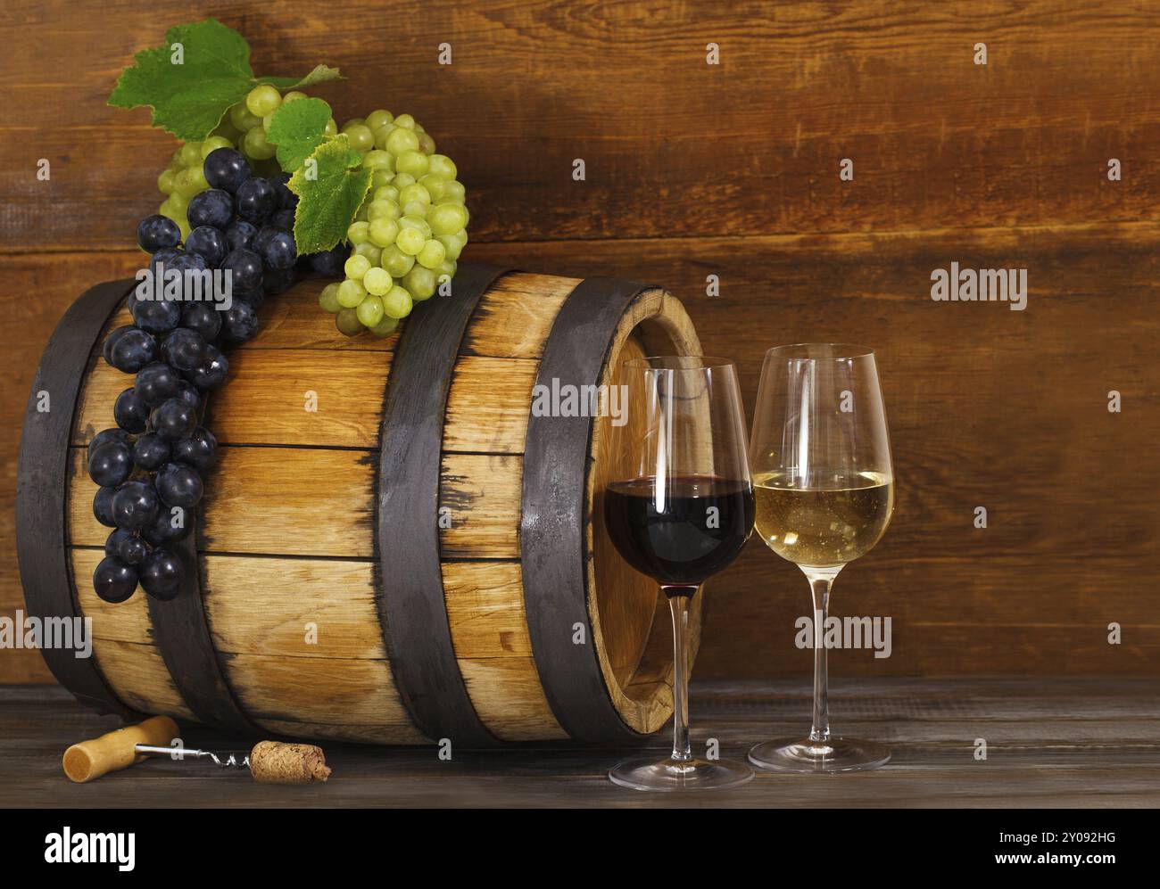 Still life with glasses of red and white wine, barrel with grapes Stock ...
