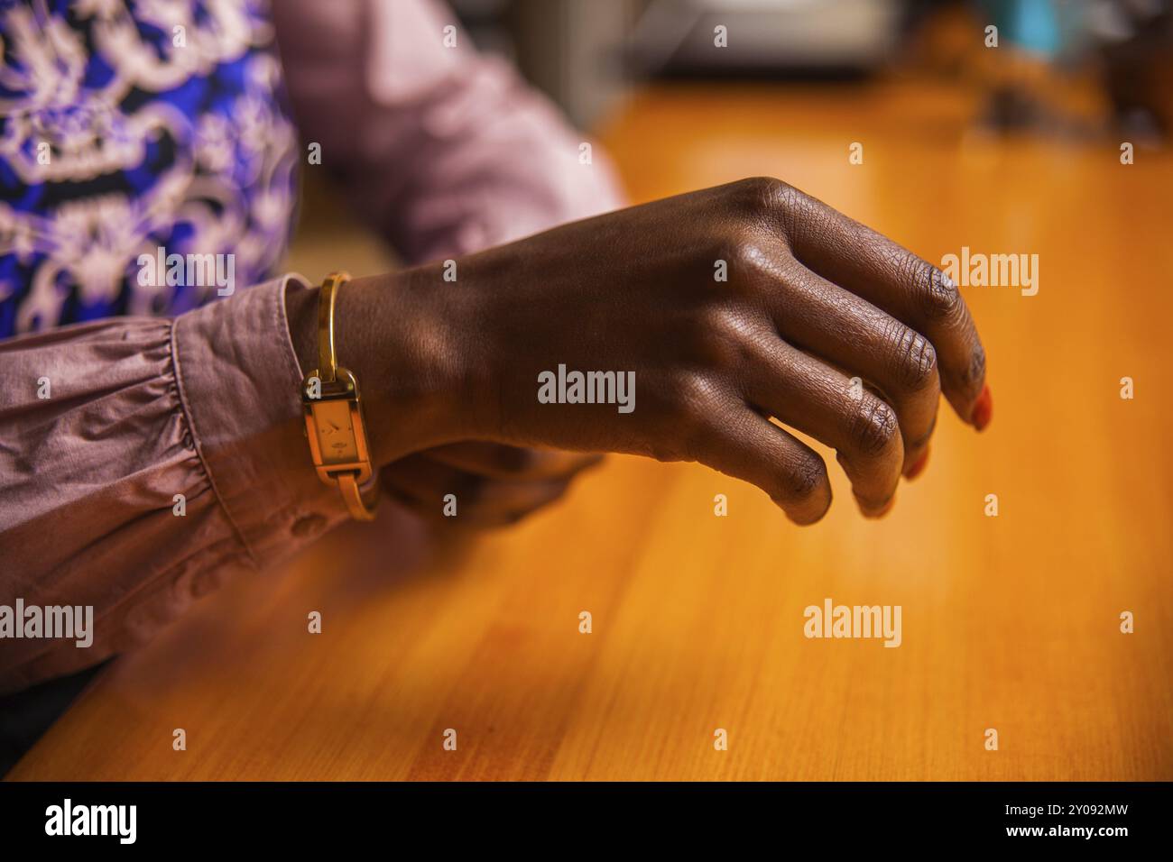 Hands that attach the watch to the wrist Stock Photo - Alamy