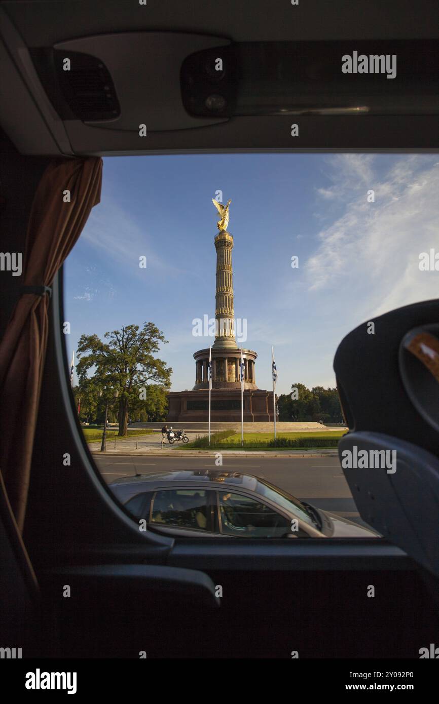 Victory Column in Berlin seen from the bus window Stock Photo - Alamy