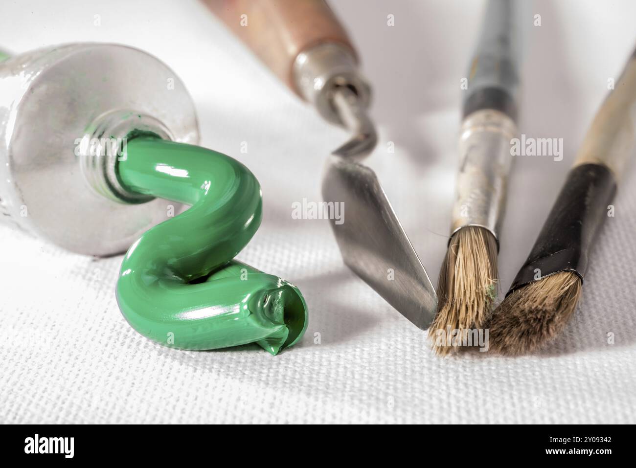 Emerald Green oil paint, squeezed from the tube on to a white canvass ...