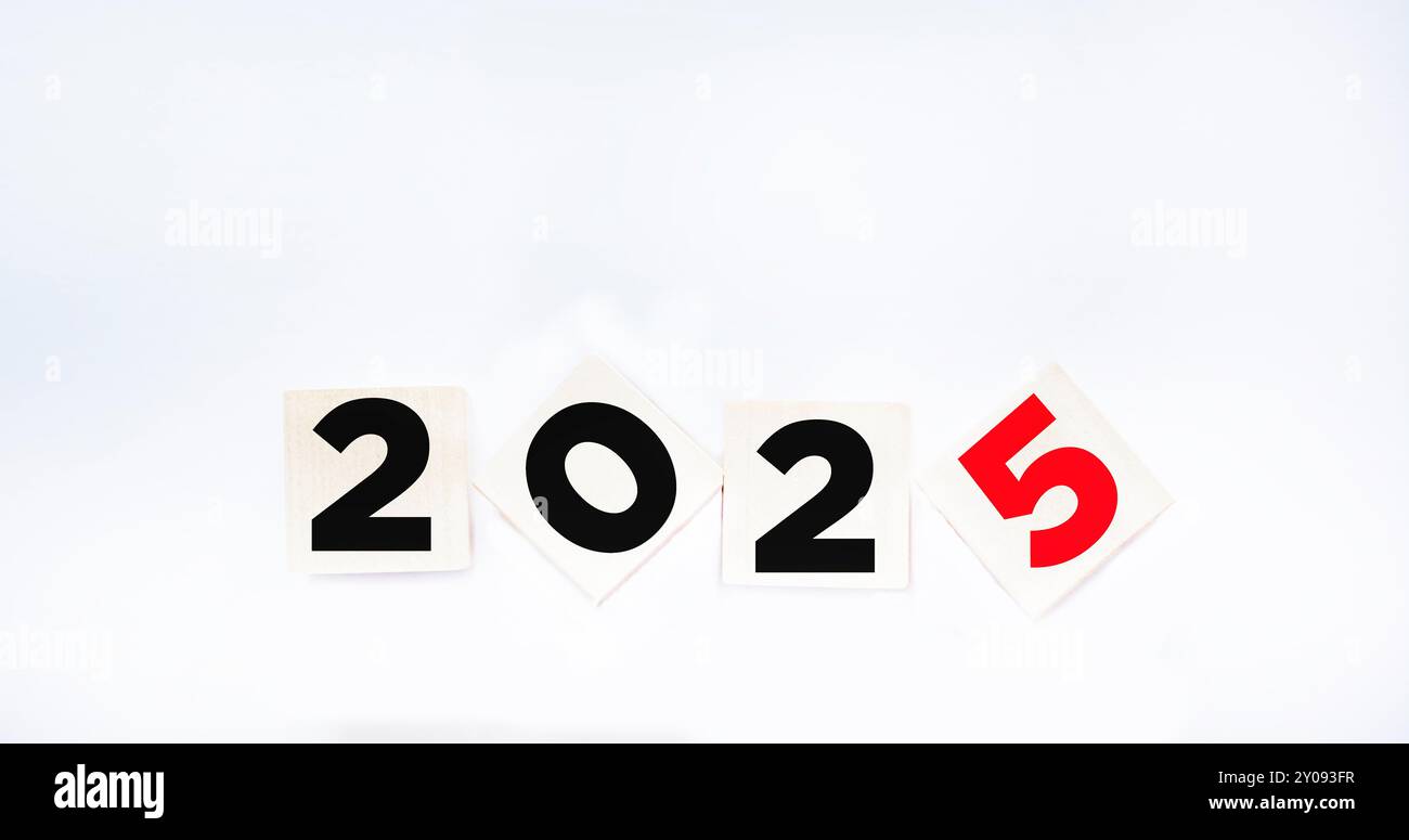 Wooden blocks with the inscription 2025 on a white background. New Year ...