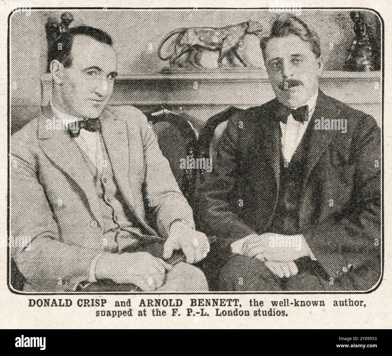 Actor / Director DONALD CRISP and set visitor author ARNOLD BENNETT ...