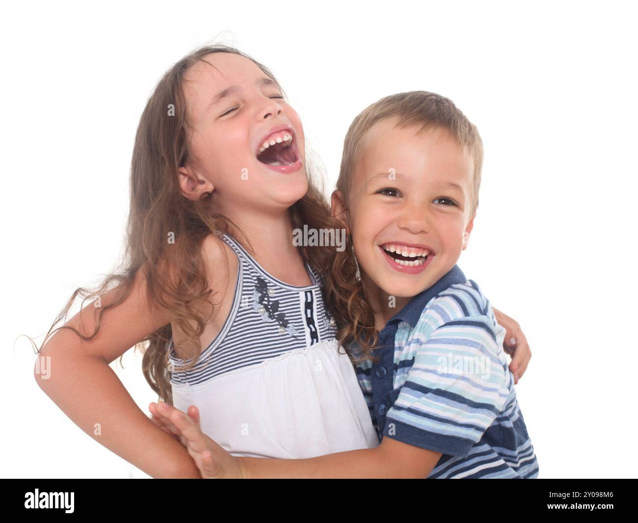 Portrait of two cheerful siblings, Little boy and girl on white ...