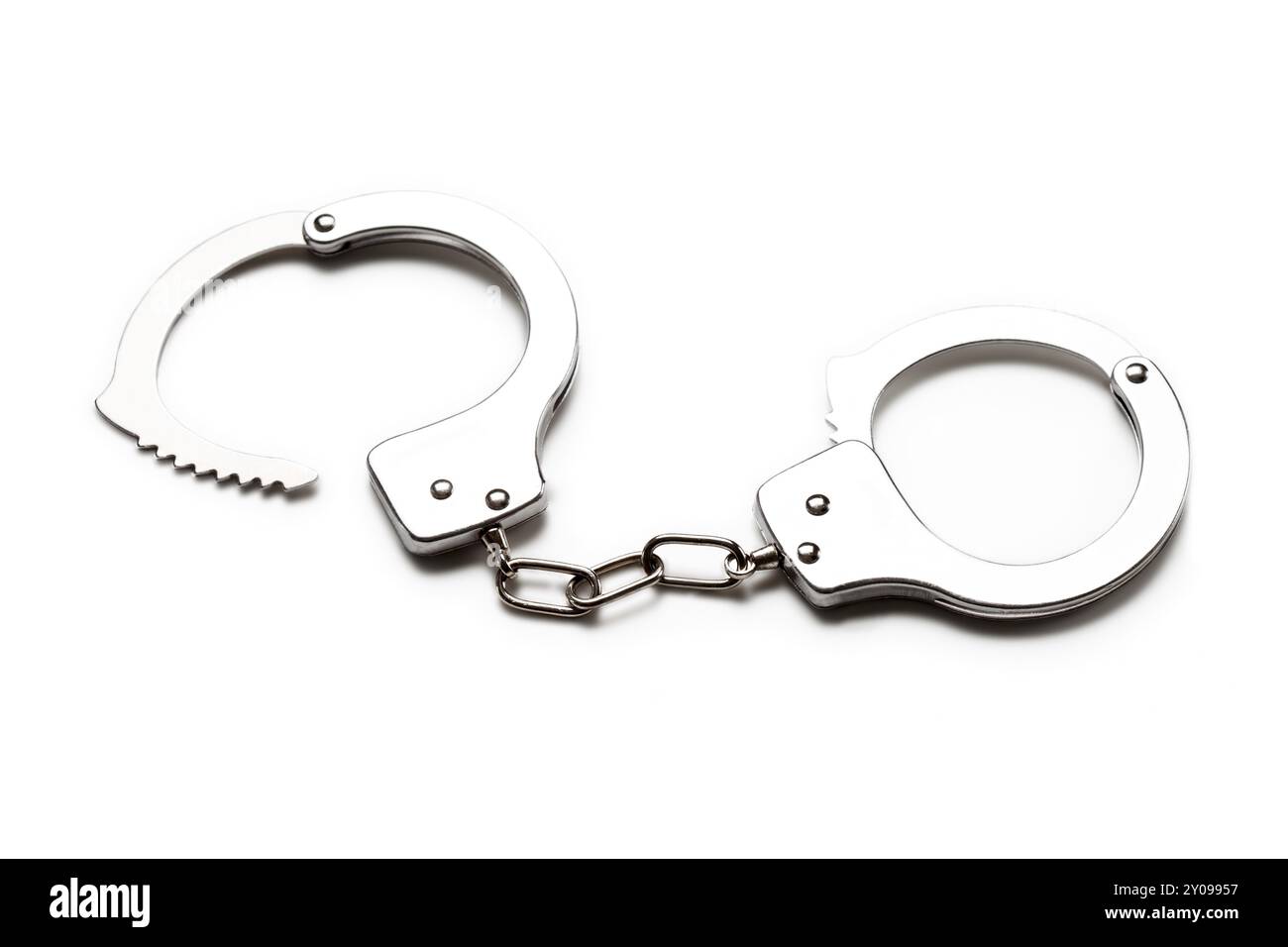 Crime law arrest police steel handcuffs isolated Stock Photo - Alamy