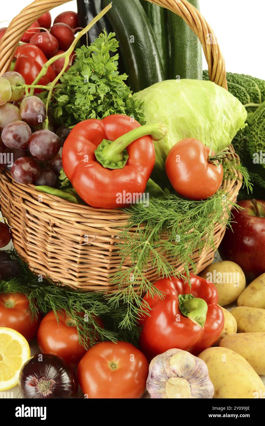 Composition with raw vegetables and wicker basket Stock Photo - Alamy