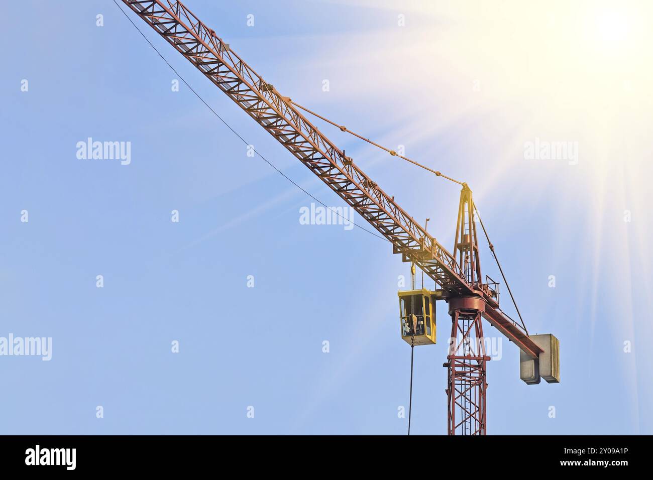 Construction crane close up on sky background Stock Photo - Alamy