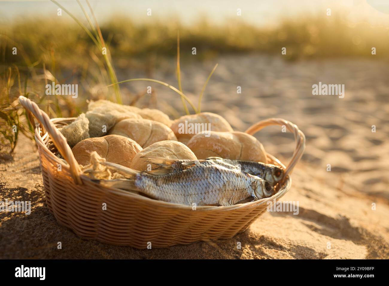 Christianity, religion, Bible concept. Five loaves of bread and two ...