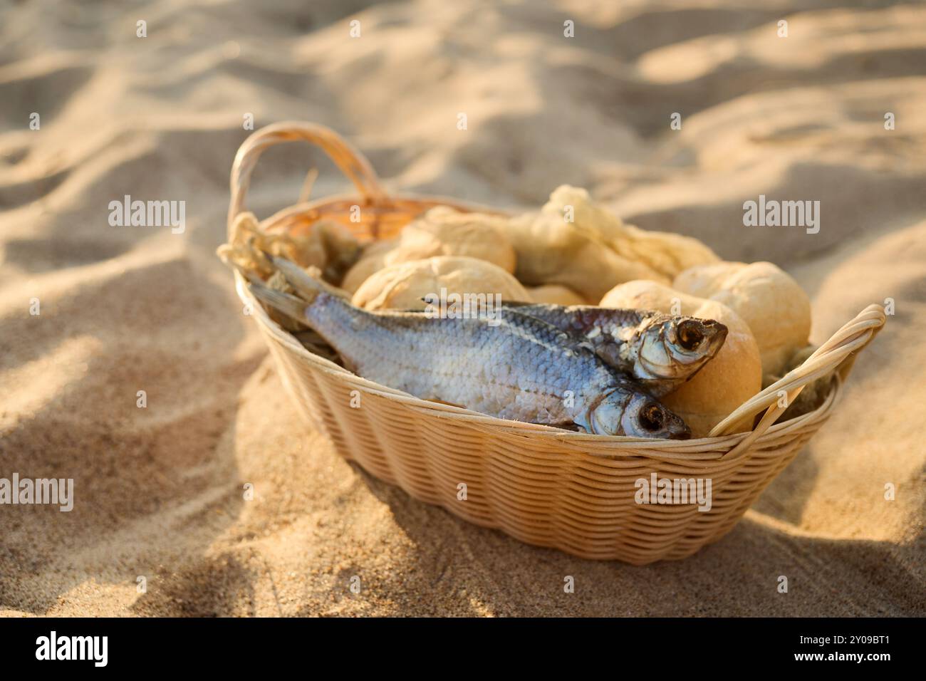 Christianity, religion, Bible concept. Five loaves of bread and two ...