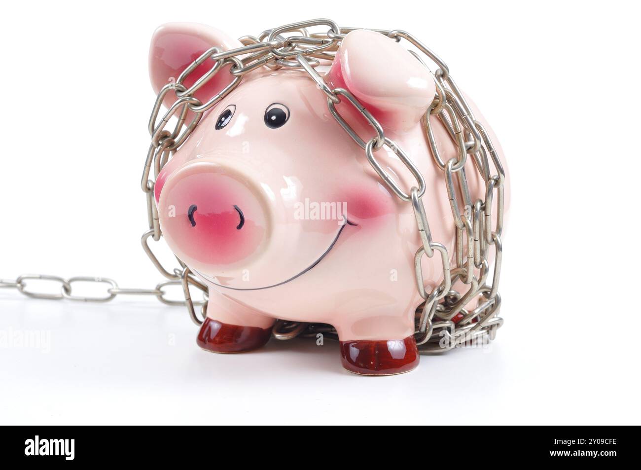 Piggy bank with metal chain Stock Photo - Alamy