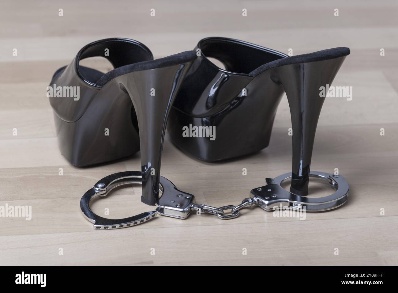 High heels and handcuffs Stock Photo - Alamy