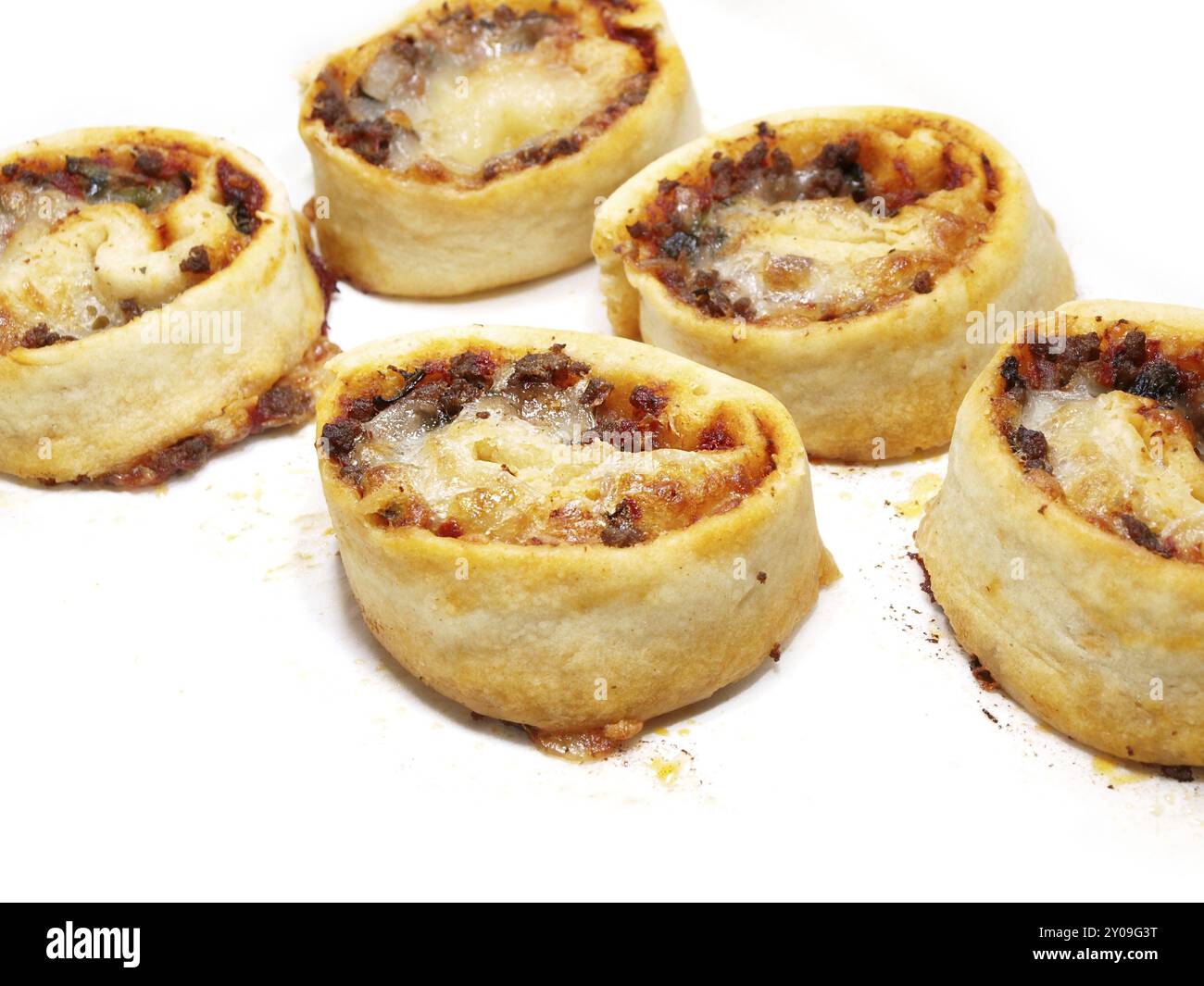 Small sized round pizza portions, in groups, towards white Stock Photo ...