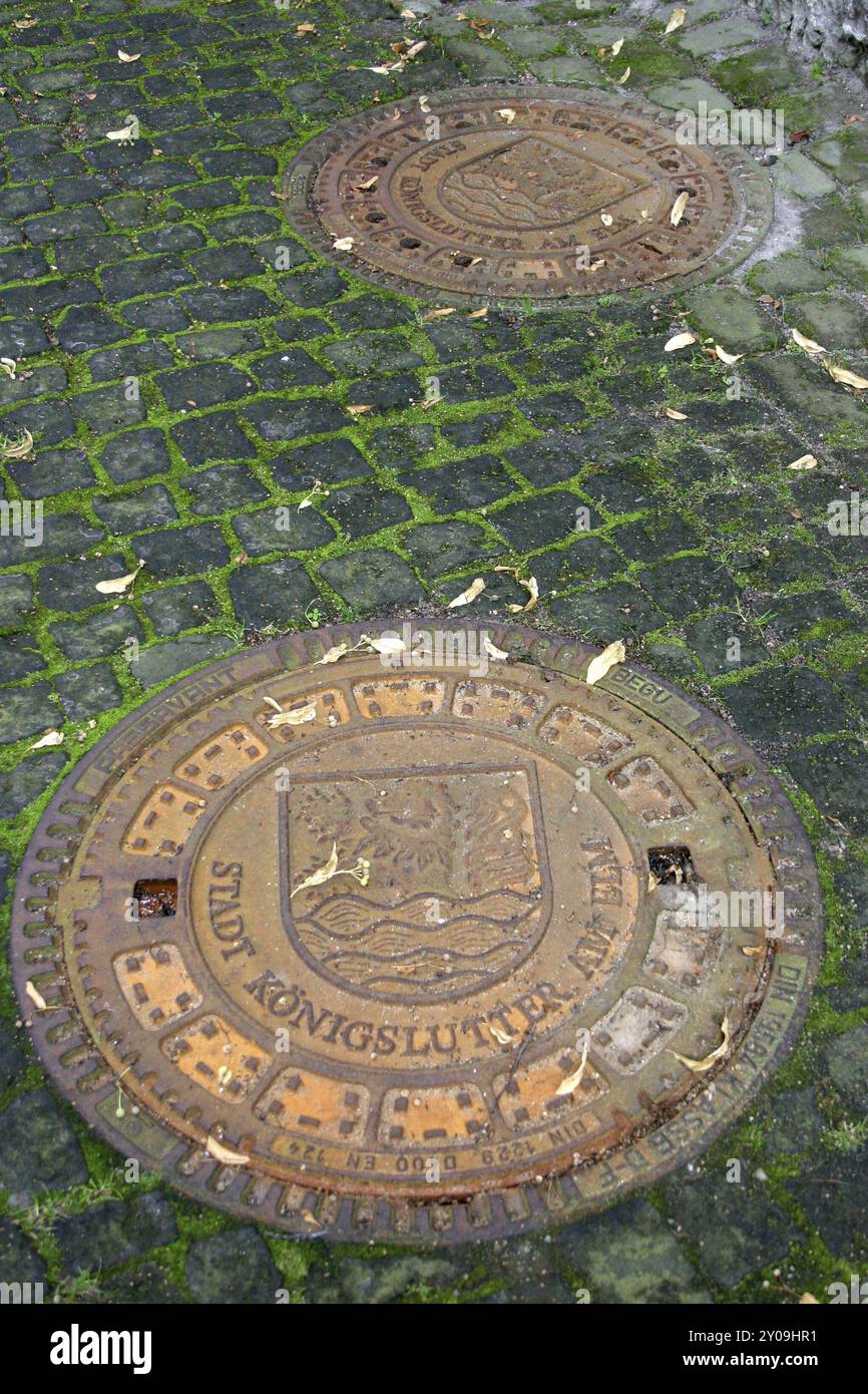 Gully cover for the town of Koenigslutter am Elm Stock Photo - Alamy