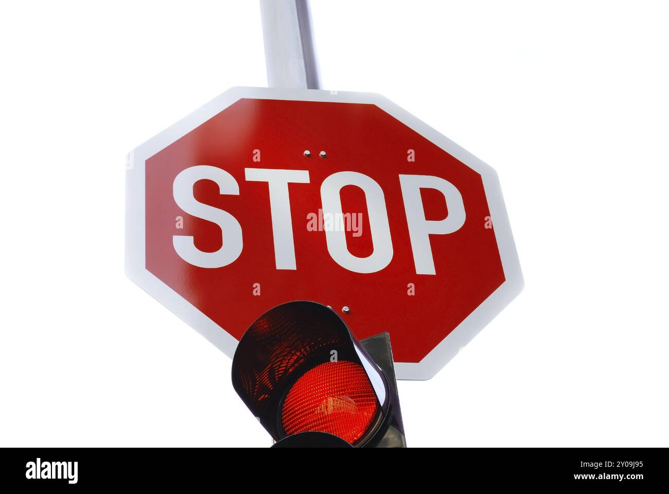 Red stop sign and traffic light Stock Photo - Alamy