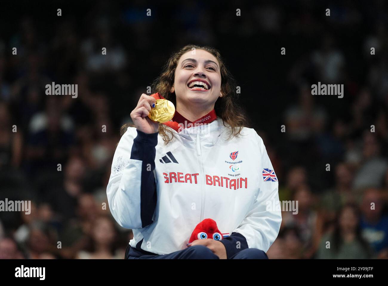 Great Britain's Grace Harvey celebrates with her gold medal after ...