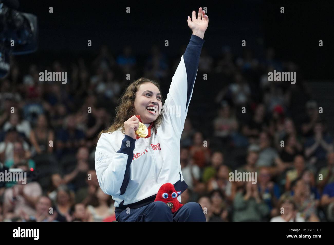 Great Britain's Grace Harvey celebrates with her gold medal after ...