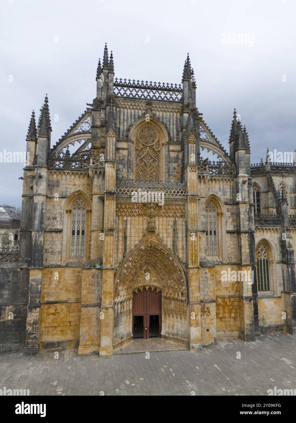 Impressive Gothic cathedral with richly decorated lancet windows and ...