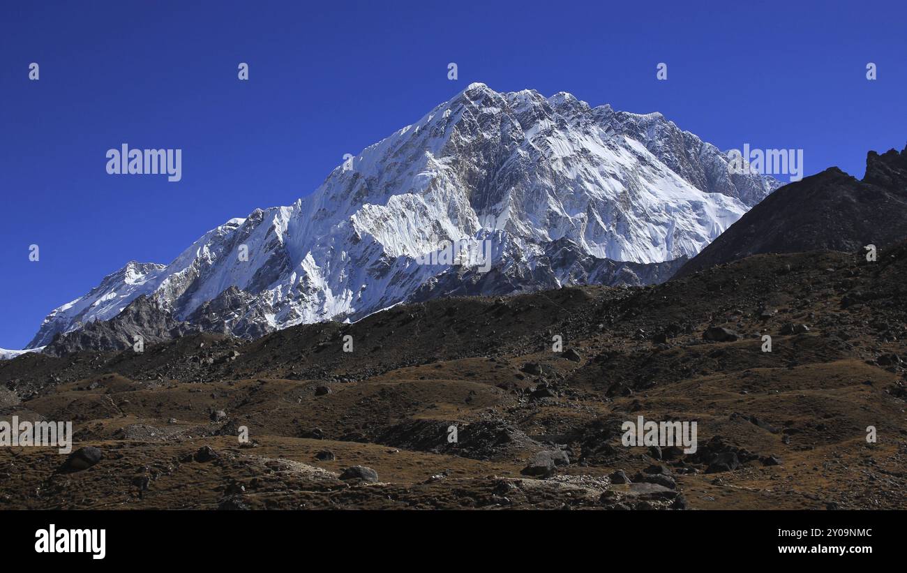 High mountain of the Himalayan range. South face of mount Nuptse ...