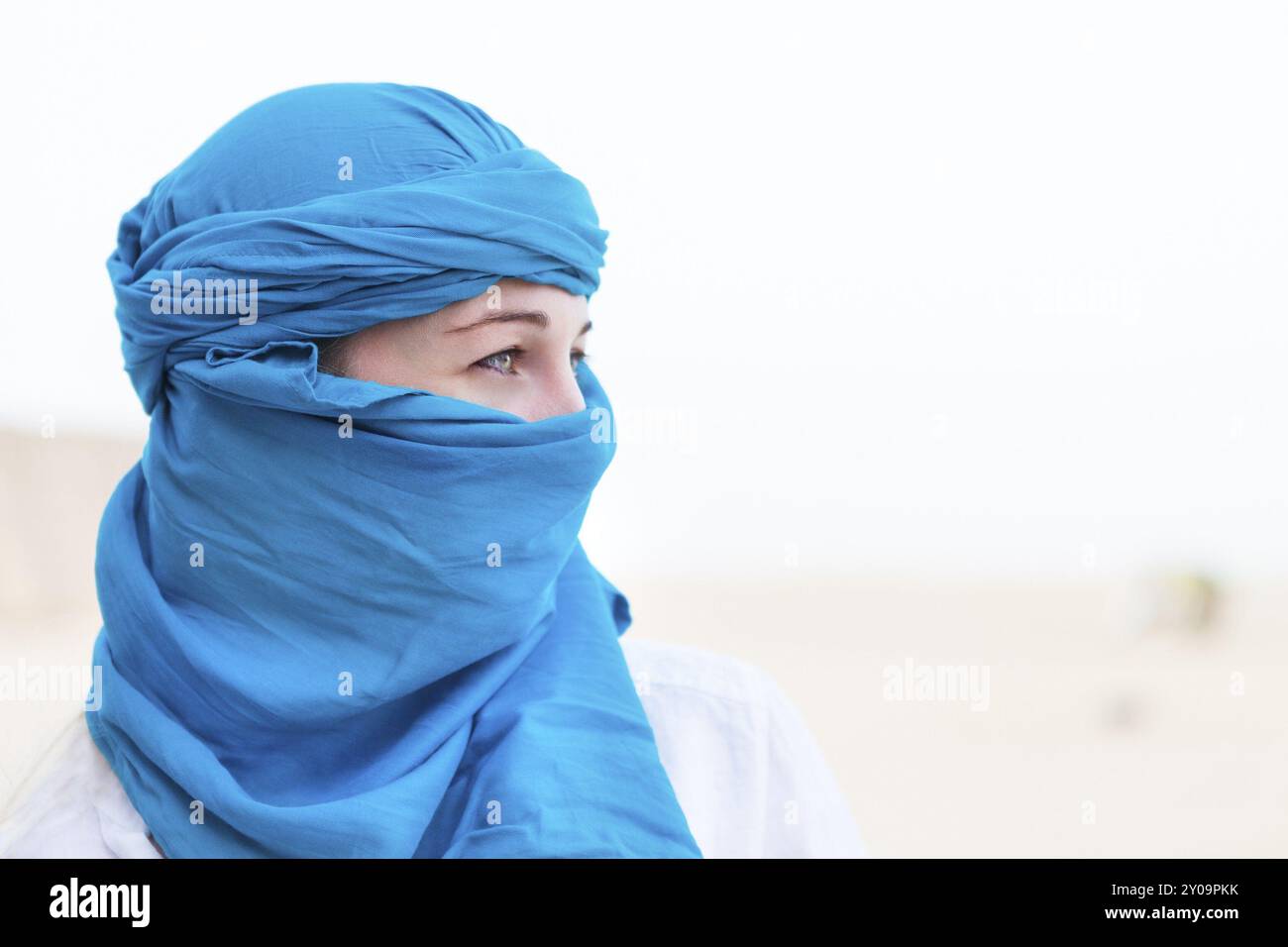 Portrait of beautiful arabic woman face posing on sunset background ...