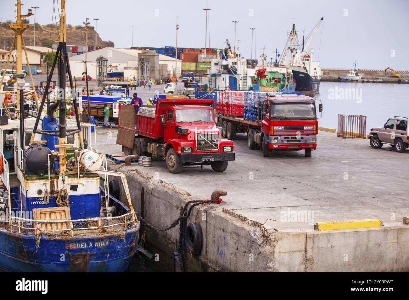Two lorries in a harbour Stock Photo - Alamy