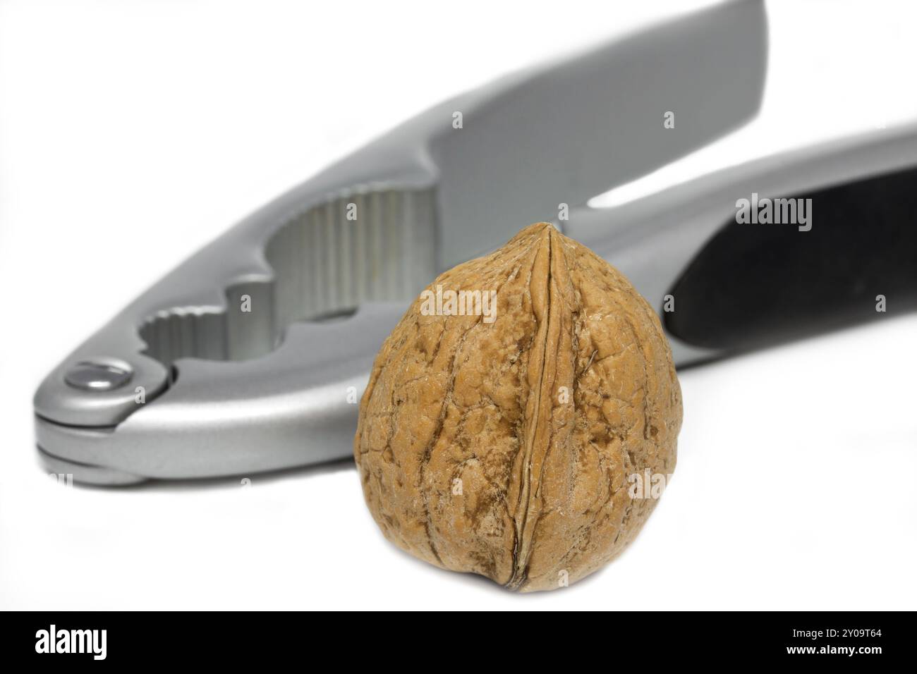 Walnut with nutcracker Stock Photo - Alamy