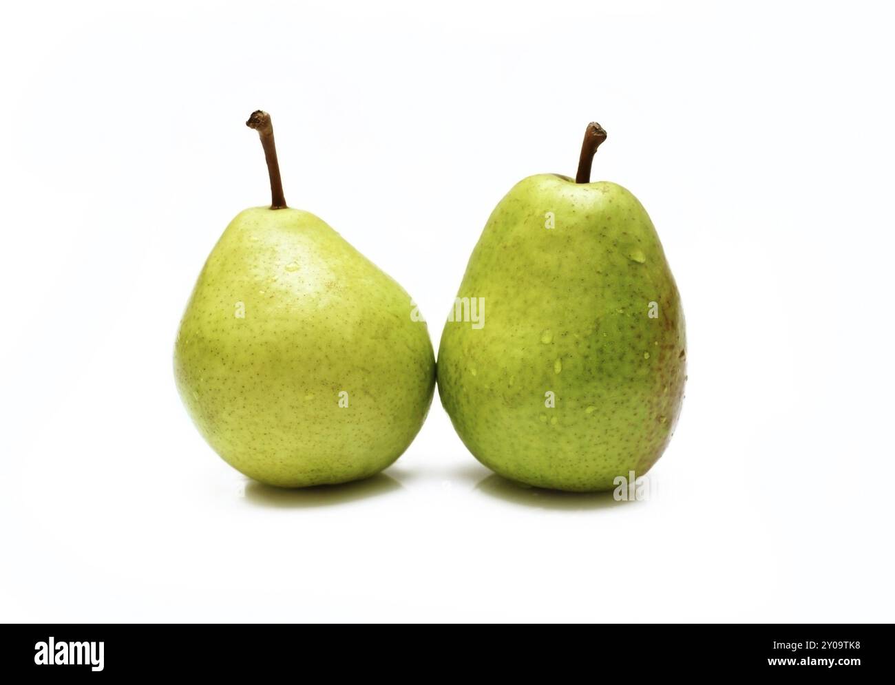Two pears isolated on white background Stock Photo - Alamy