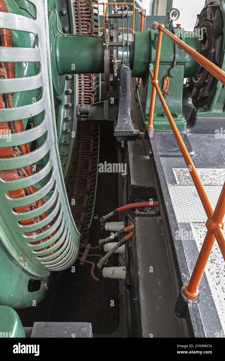 Historic generator in an old power station Stock Photo - Alamy