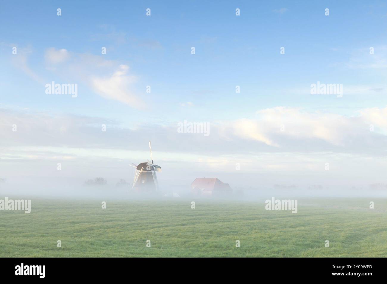 Windmills in mist hi-res stock photography and images - Alamy