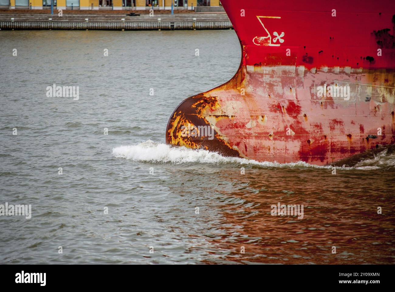 The bulb and bow of a red ship Stock Photo - Alamy