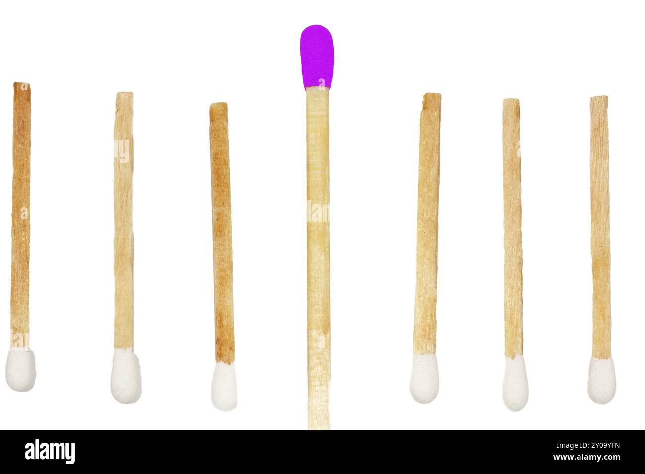 Six small matches and one large match of a different colour Stock Photo ...