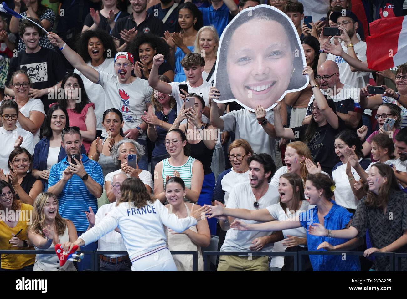 France's Emeline Pierre celebrates with her gold medal after winning ...