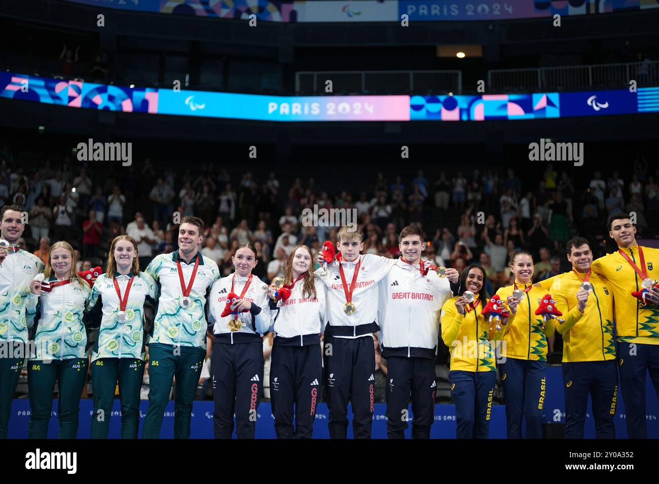 Great Britain's (centre) Willaim Ellard, Rhys Darbey, Poppy Maskill and ...
