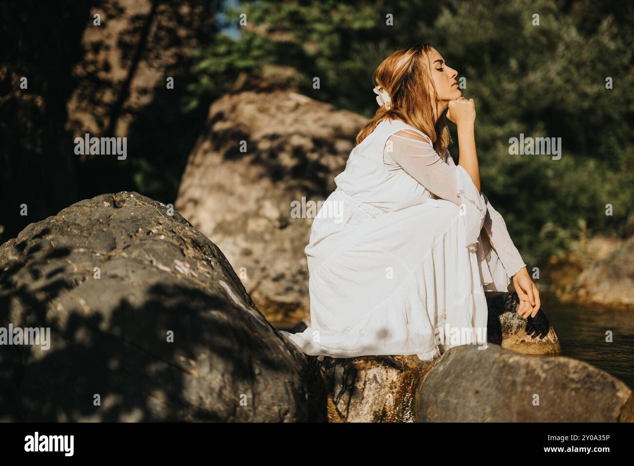 Pensive woman in rocky hi-res stock photography and images - Alamy