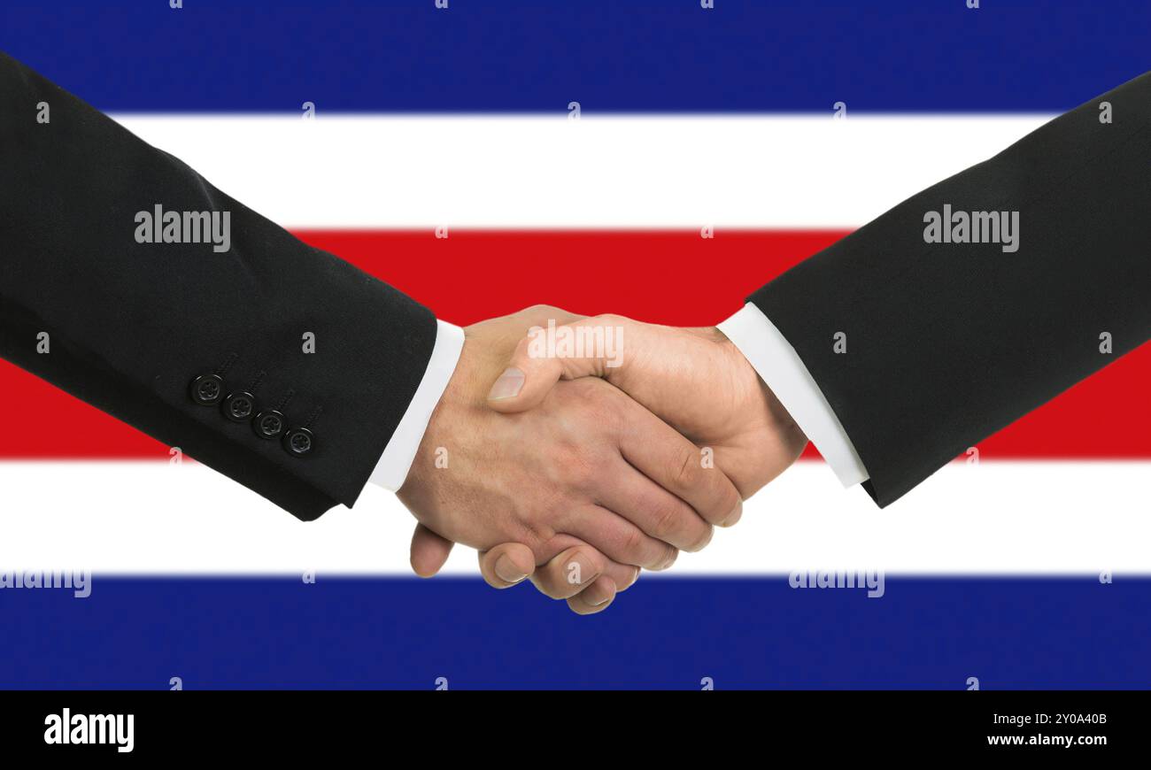 The Costa Rica flag and business handshake Stock Photo - Alamy