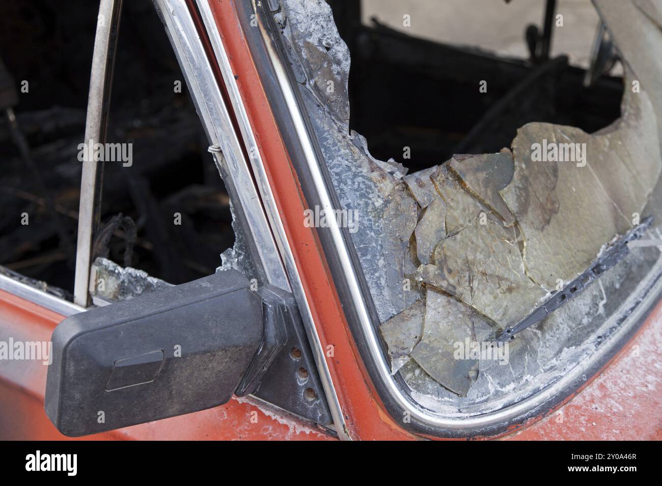 Wreck accident fire burnt wheel car vehicle junk Stock Photo - Alamy