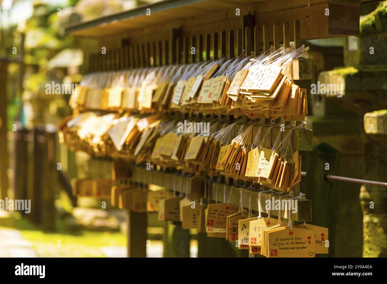 Many small signs or plaques called wooden ema tags carrying written ...