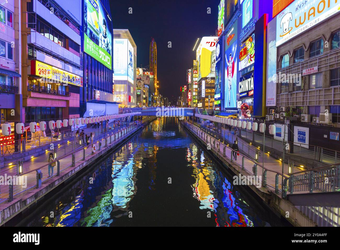 OSAKA, JAPAN, JUNE 23, 2015: Bright illuminated signs on banks of ...
